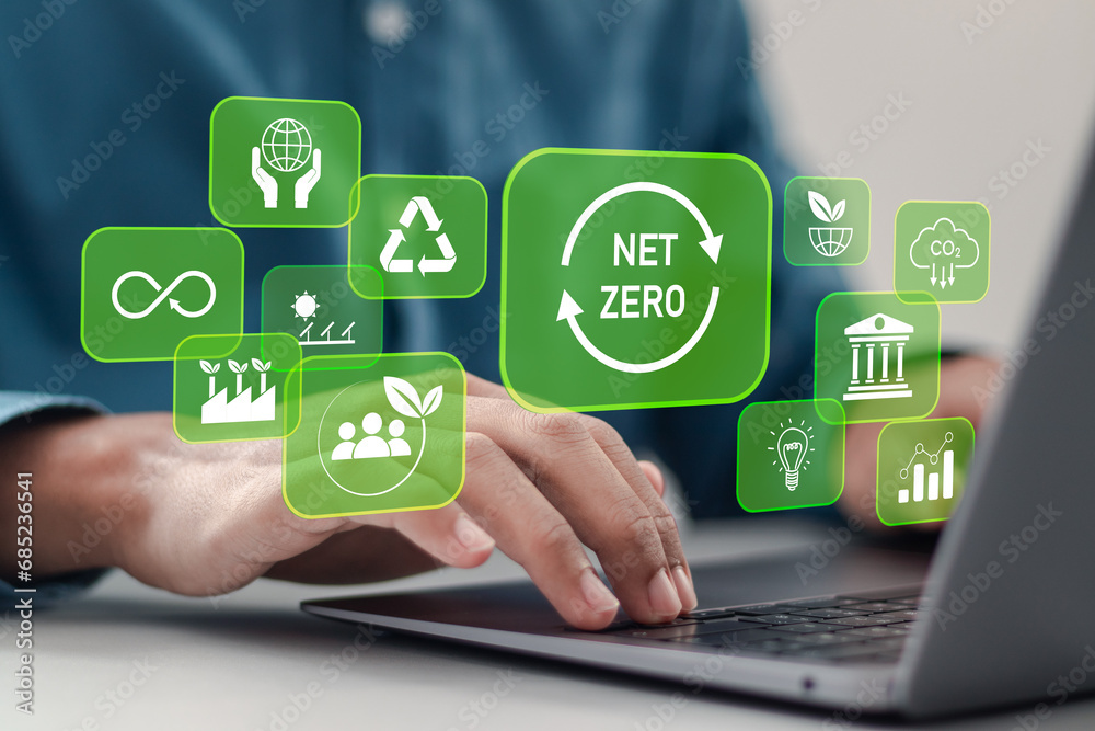 Net zero and carbon neutral concept. Businessman using laptop with net ...