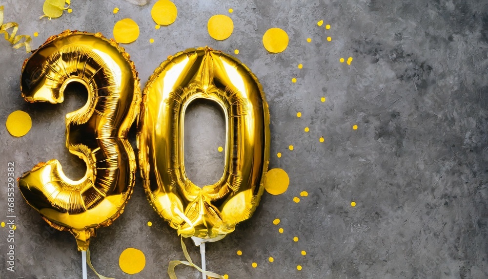 yellow foil balloon number number thirty on a concrete background 30th ...