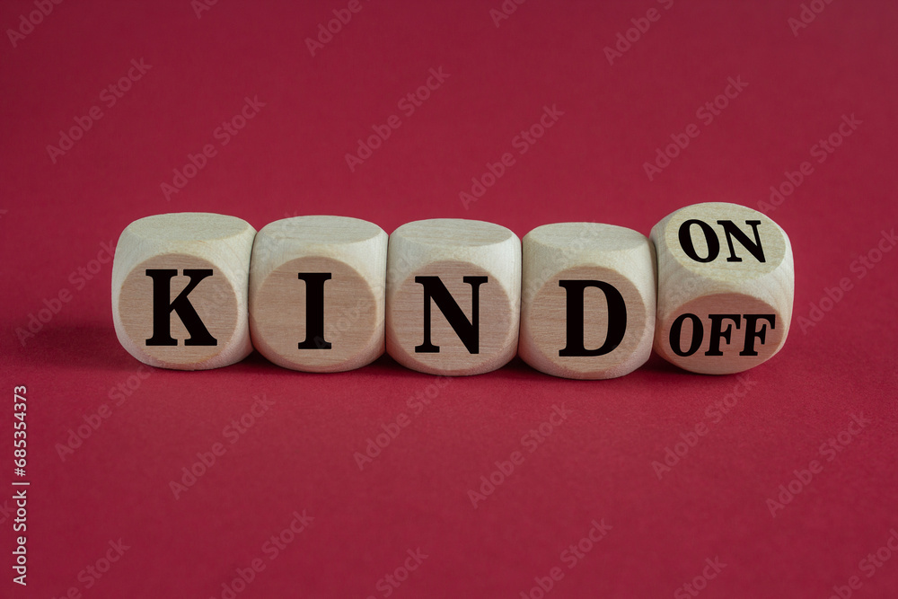 Kind on or off symbol. Turned wooden cubes and changes word Kind off to ...