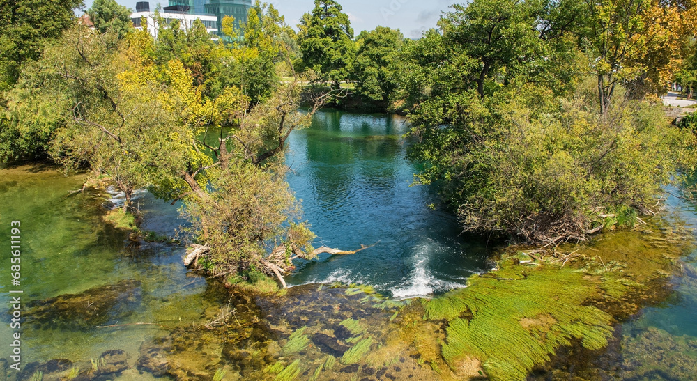 The River Una as it passes through central Bihac in Una-Sana Canton ...