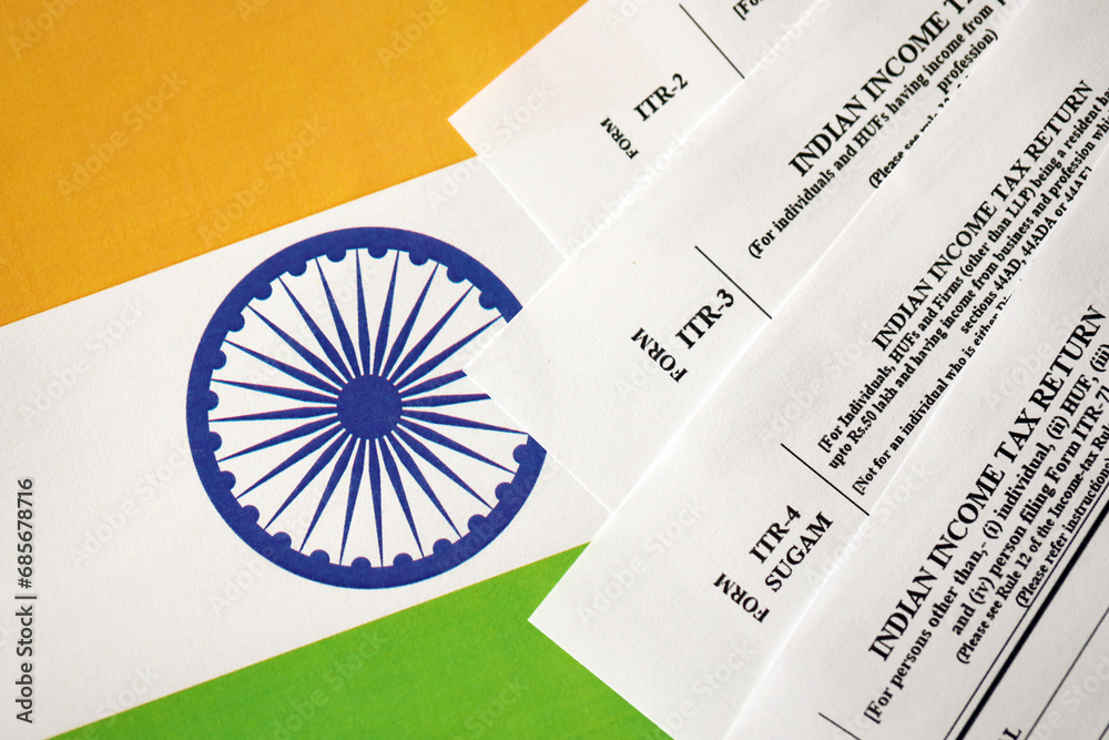 Indian income tax return blank forms on indian country flag close up ...