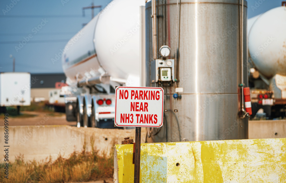 Restricted area, warning sign, tanks with fuel Stock Photo | Adobe Stock