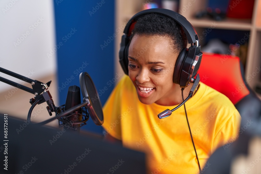 African american woman streamer smiling confident having video call at ...
