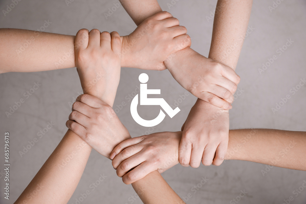 Inclusion concept. People holding hands together around international ...
