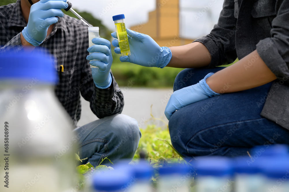 Environmental Engineers Inspect Water Quality, pH Test and Take Water ...