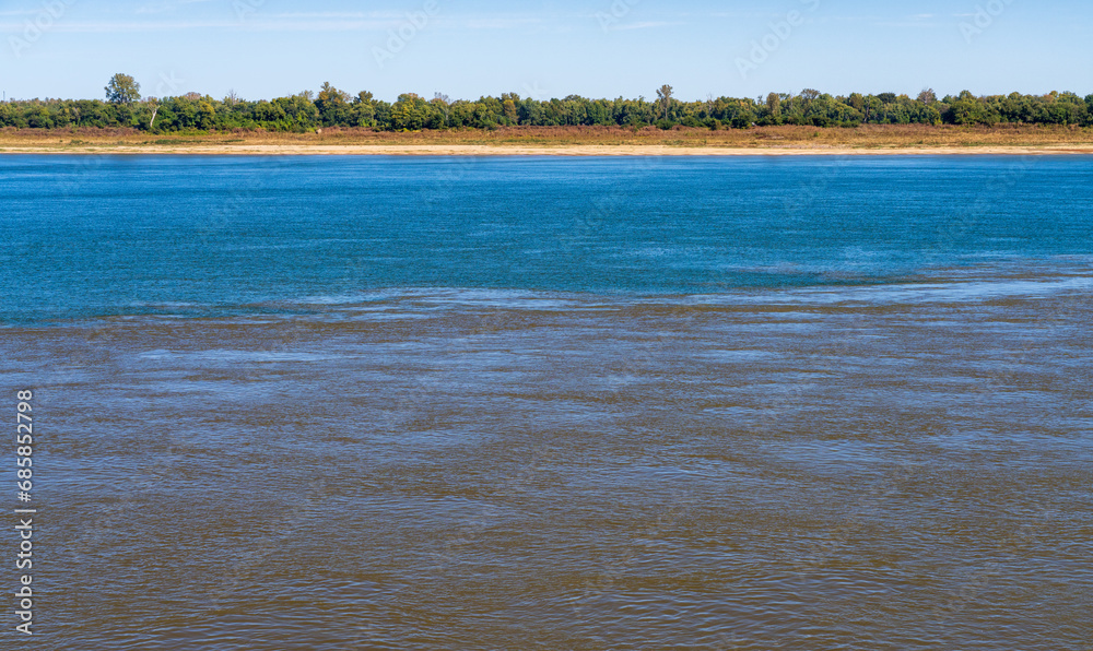 Confluence of the blue Ohio river and brown Mississippi river at Cairo ...