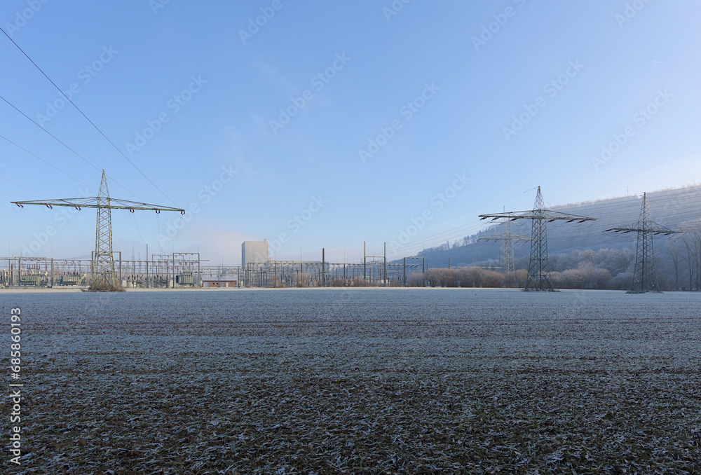 Würgassen, Germany - 12/17/2022: Several high-voltage pylons on a ...