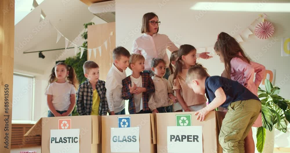 children in a school preparation club lay out different types of ...