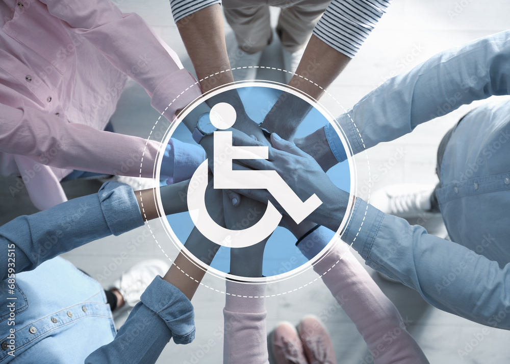 Inclusion concept. International symbol of access. People holding hands ...
