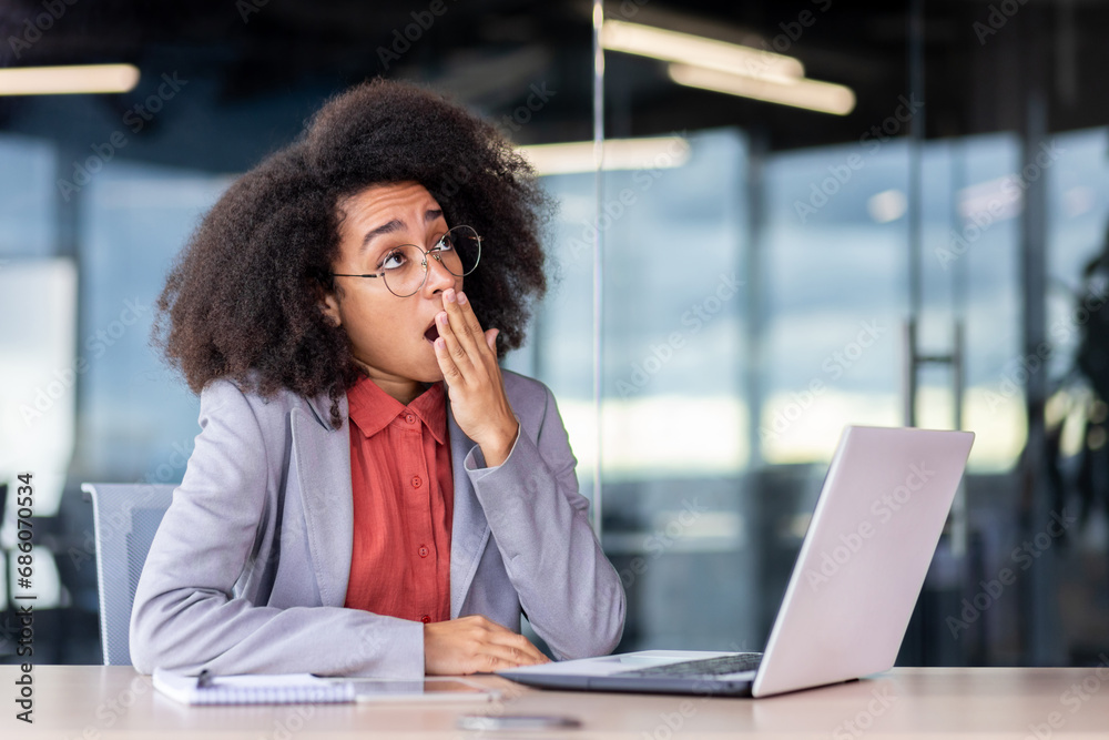 Boring daily routine work inside office, business woman yawning ...