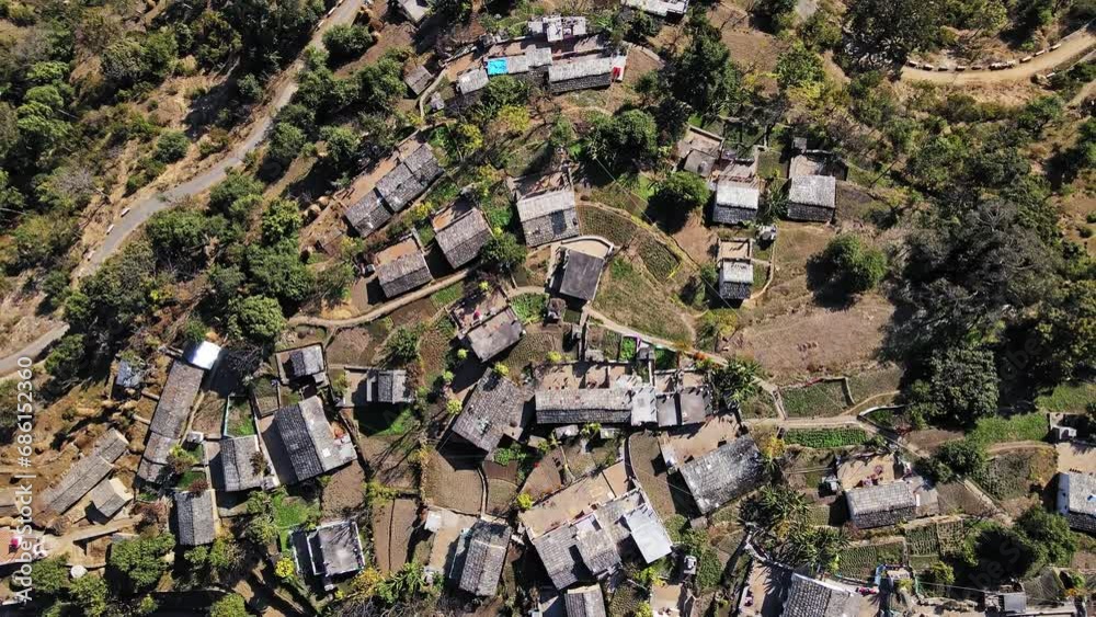 Bird-eye view of terraced houses and terrace farming in a remote hilly ...