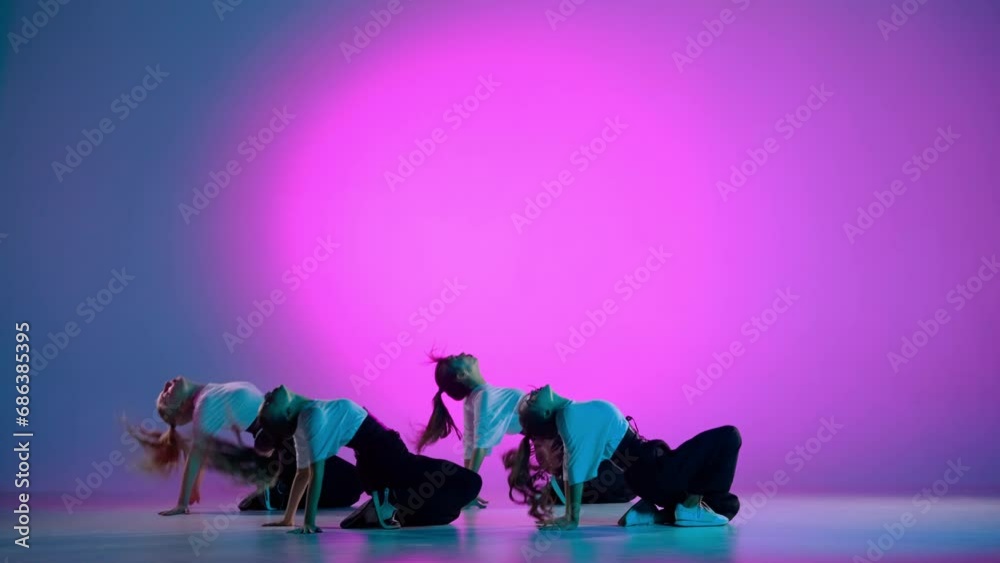 In the frame on a purple background, gradient. Dancing group consisting ...
