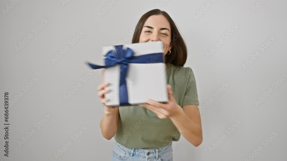 Excited young hispanic woman with raised arms celebrates victory ...
