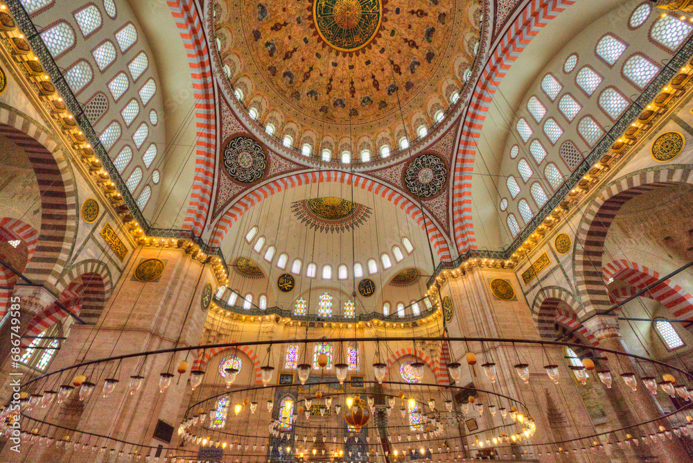 Interior of the Suleymaniye Mosque, view of domed ceiling and light ...