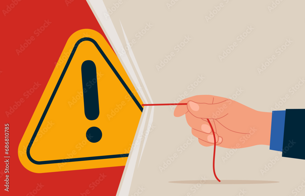 Hand pulling light blank fabric with incident with exclamation ...