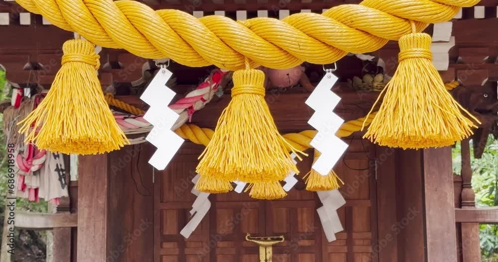 A Shimenawa lengths of laid rice straw or hemp rope used for ritual ...