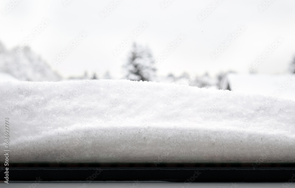Snow buildup outside of window sill after snow storm or arctic winter ...