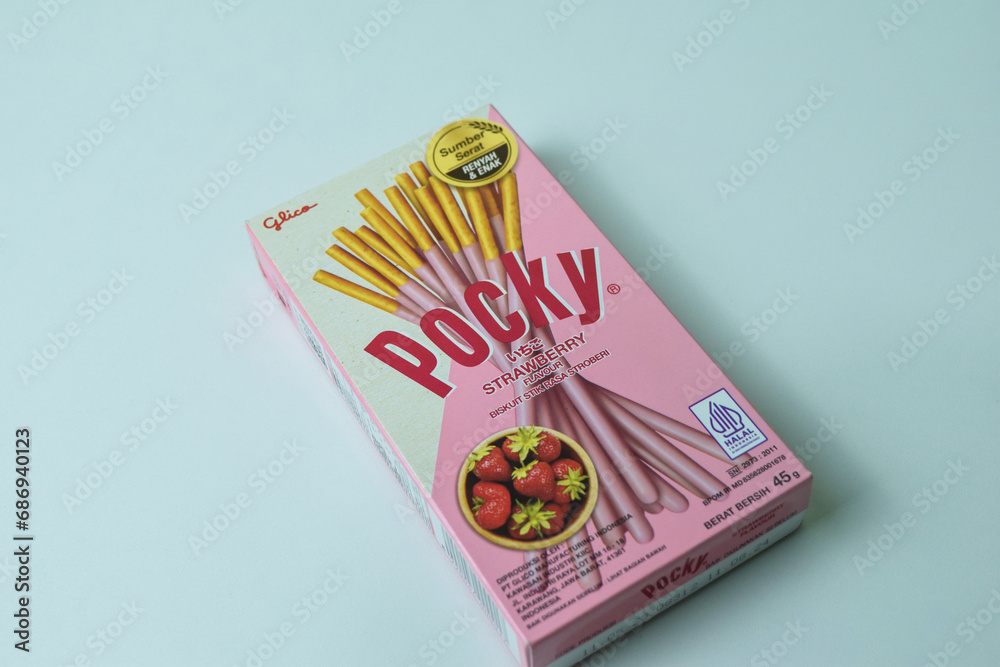 Pocky brand of chocolate sticks on white background. Pocky is a famous ...