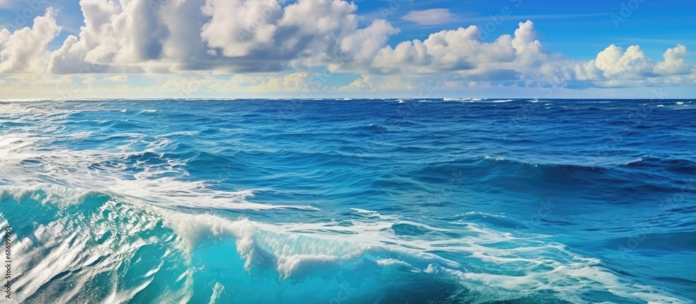 stunning summer landscape, the crystal blue ocean seamlessly blends ...