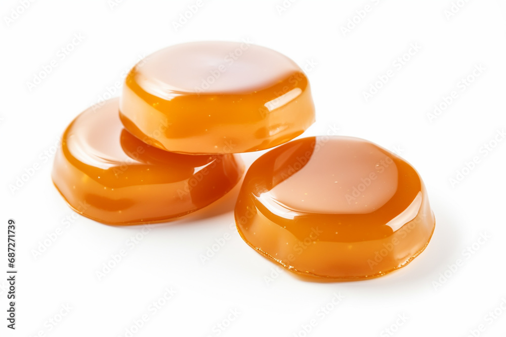 Caramel Candies with Caramel Sauce Isolated on a White Background Close ...