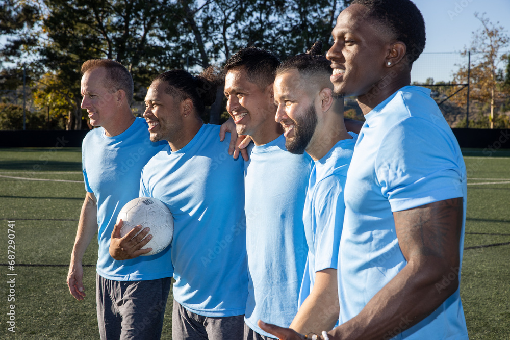 Group of five men on a soccer team. The players are standing proudly ...