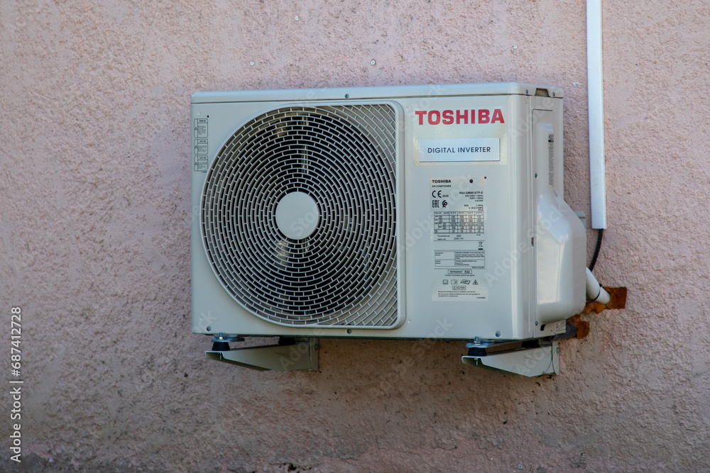 toshiba inverter air conditioner logo brand and text sign on equipment ...