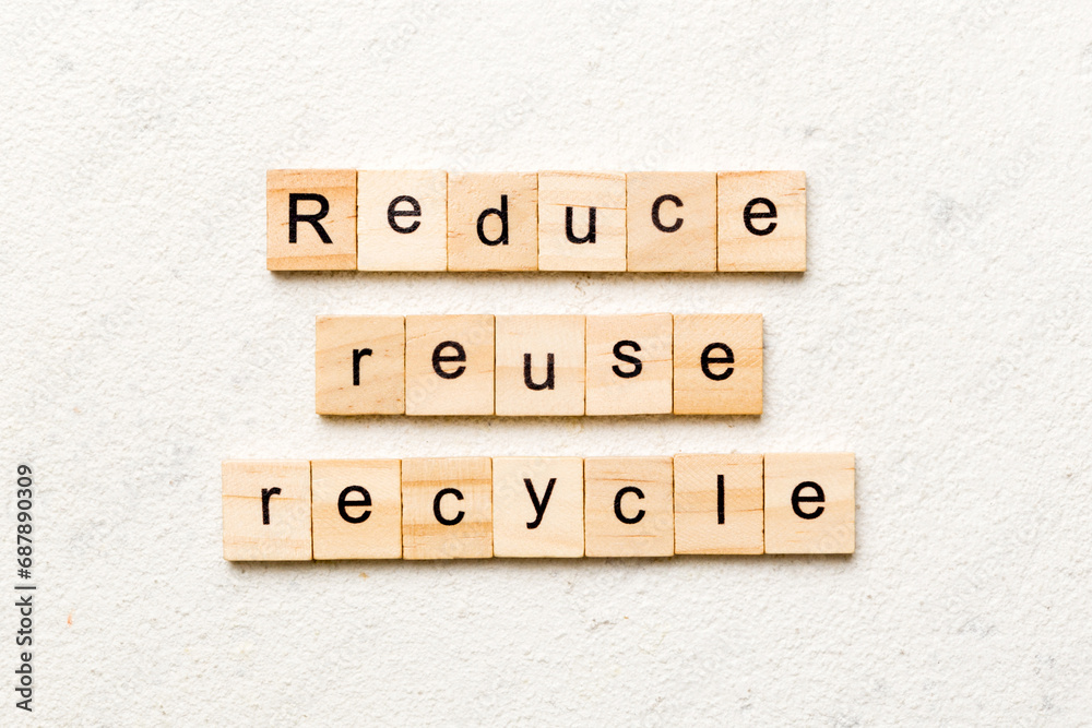 reduce, reuse and recycle word written on wood block. reduce, reuse and ...