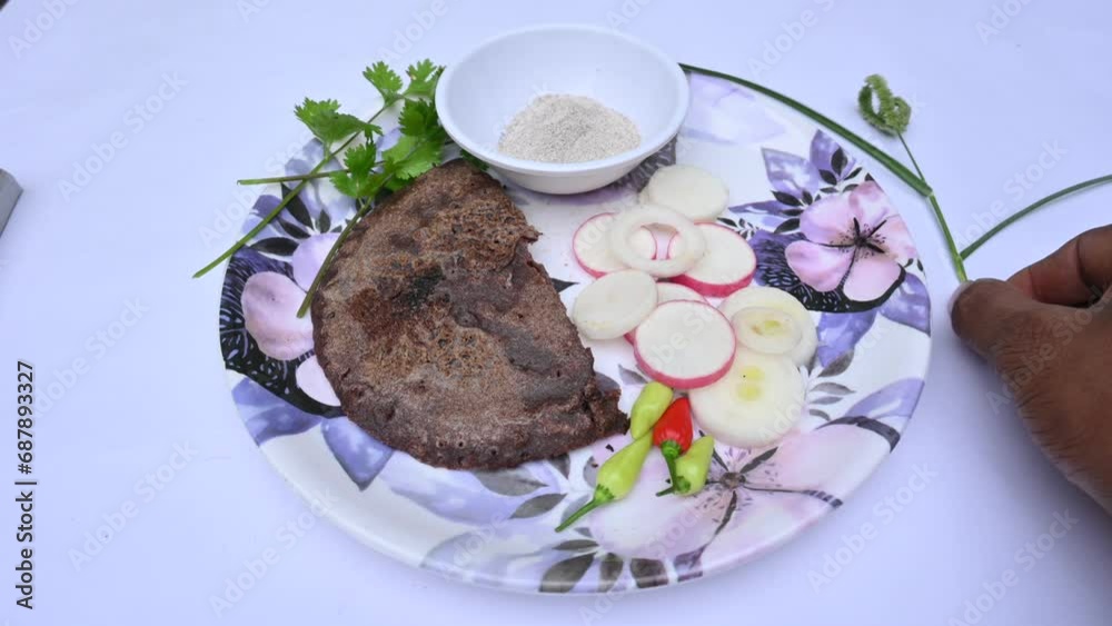 Eleusine coracana or finger millet chapati. Its other names Ragi and ...