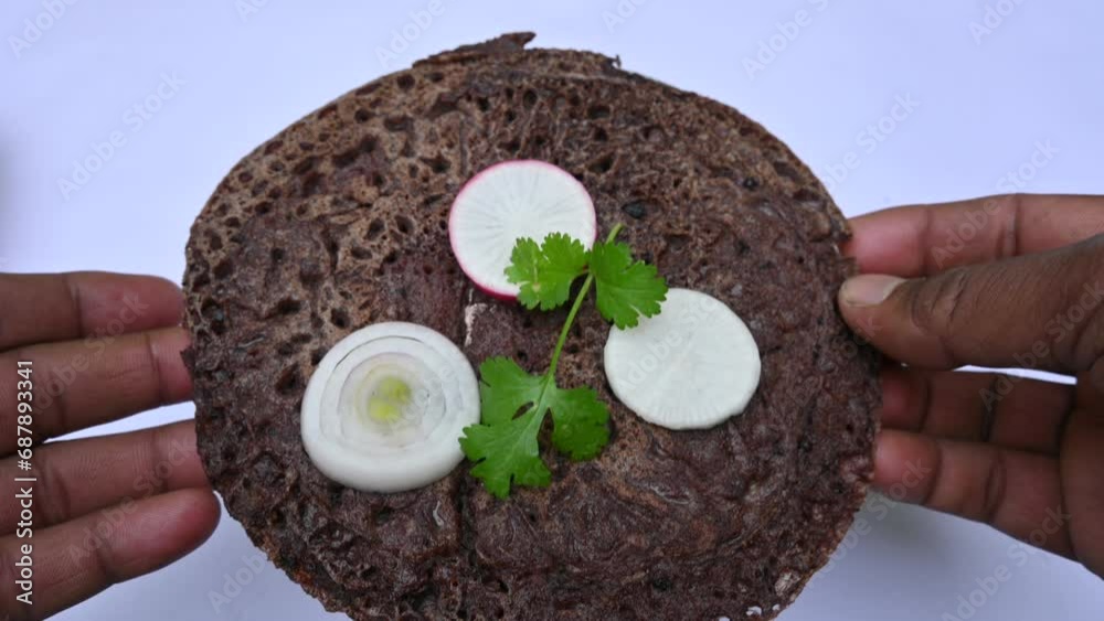 Eleusine coracana or finger millet chapati. Its other names Ragi and ...