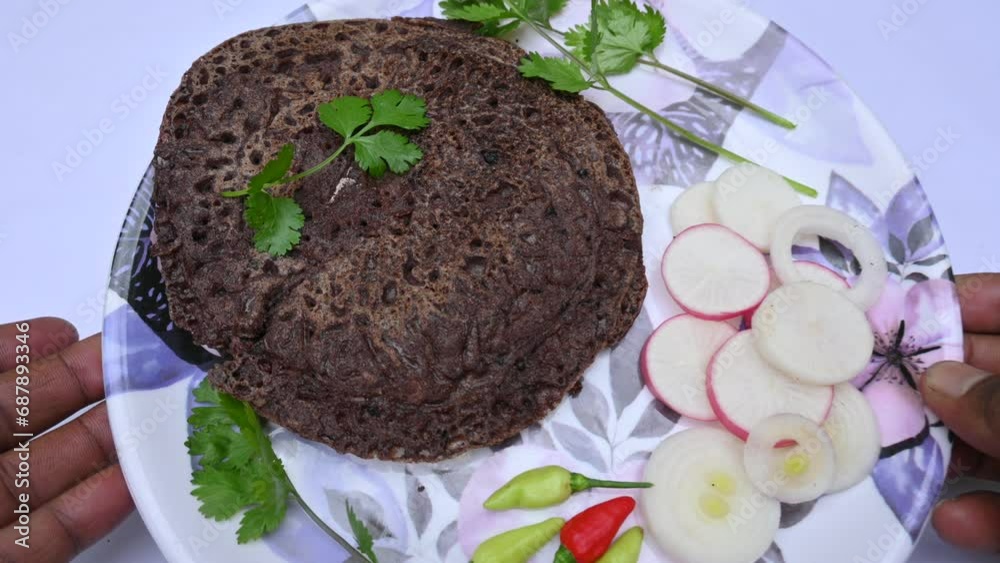 Eleusine coracana or finger millet chapati. Its other names Ragi and ...