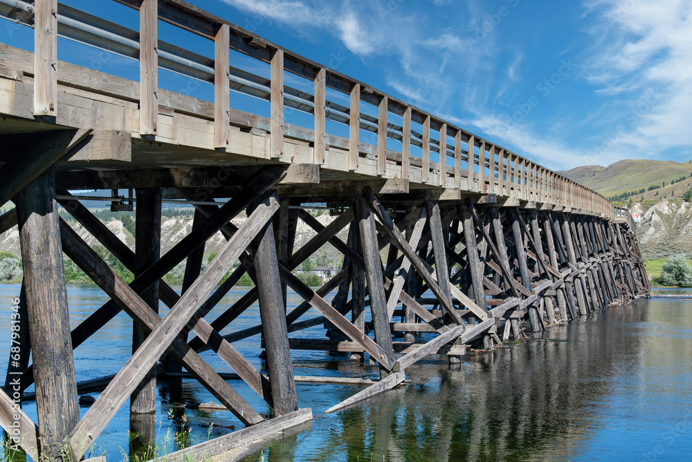 Full length view of wooden Pritchard Bridge (stringer bridge) across ...