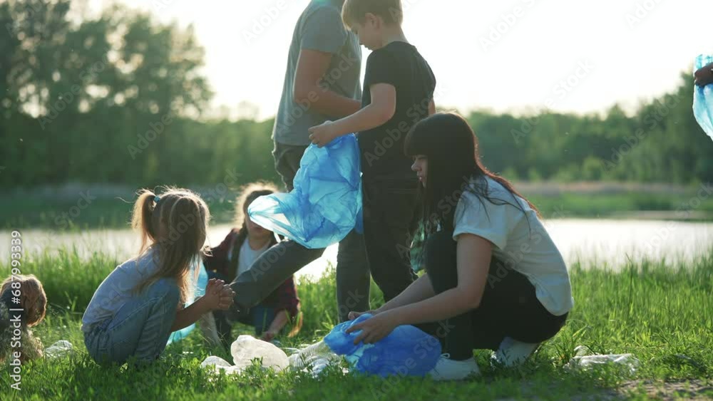 saving nature garbage collection. a group of volunteers save ...