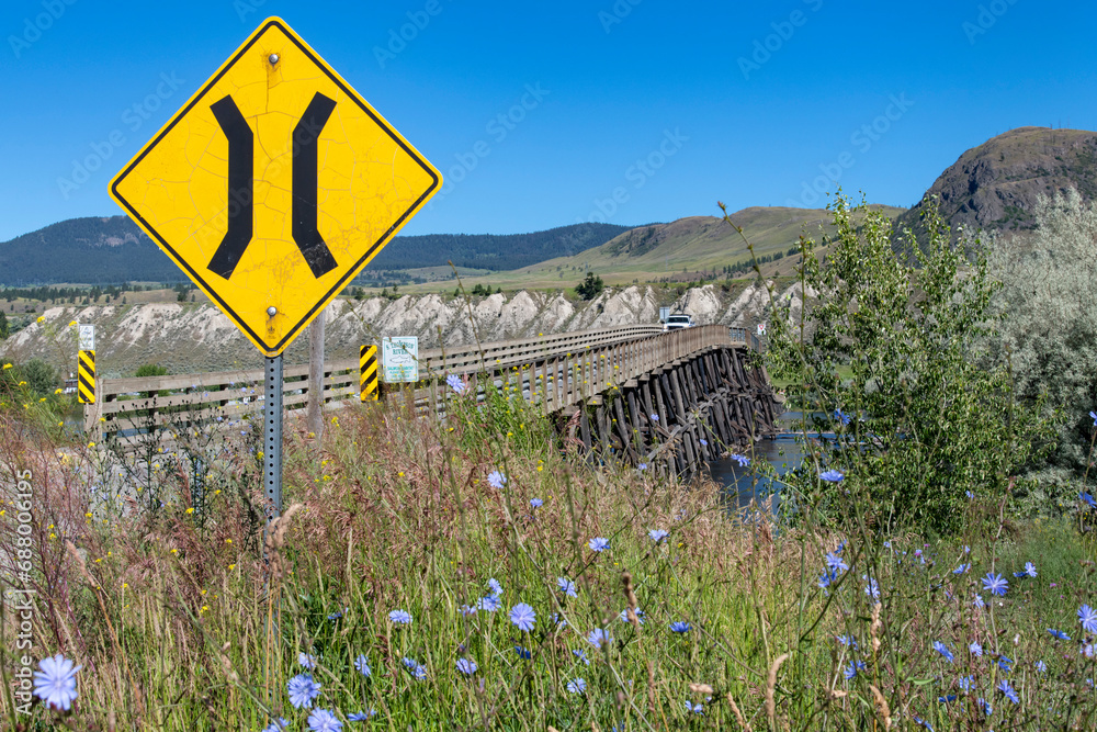Full length view of wooden Pritchard Bridge (stringer bridge) across ...