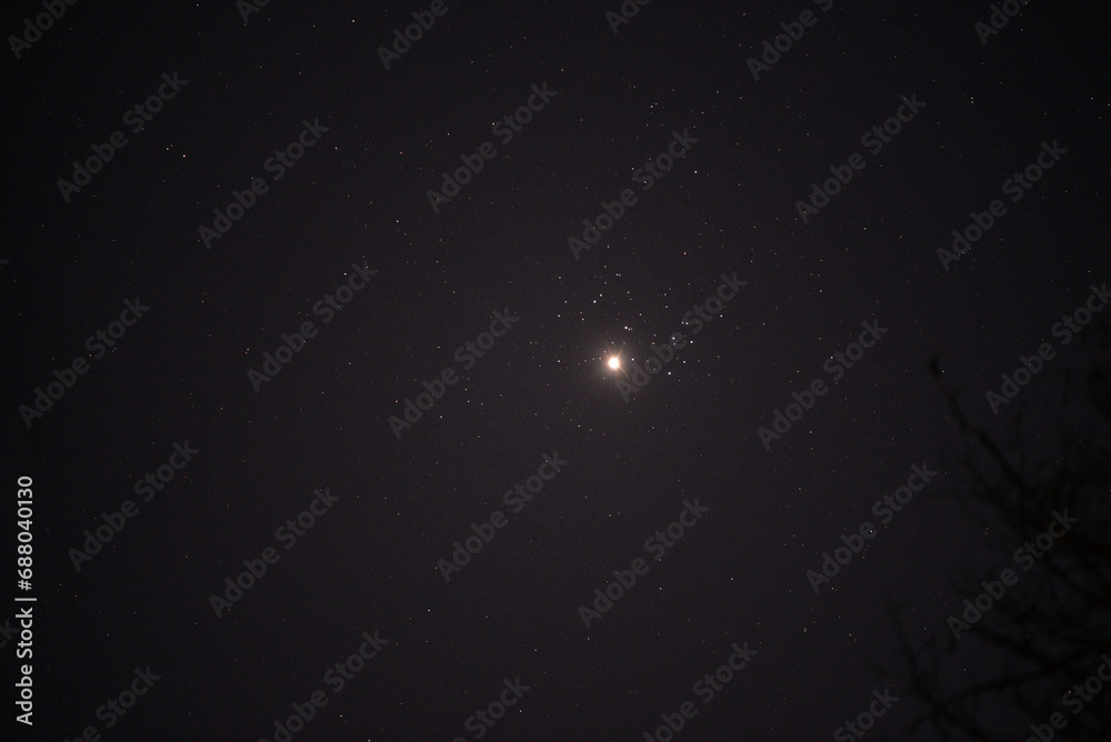 The planet Venus in the starry night sky in conjunction with the ...