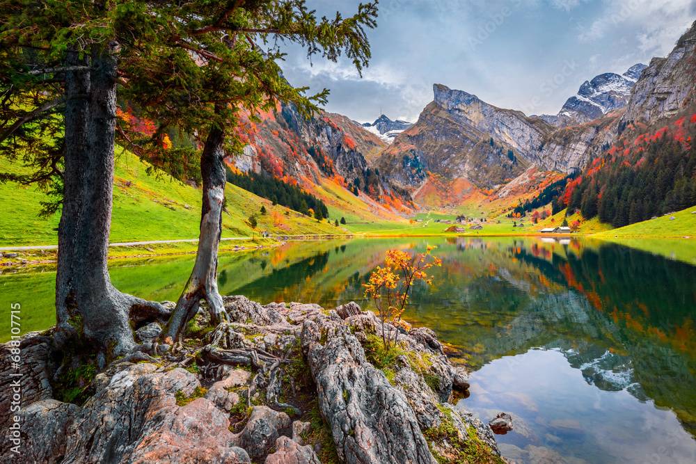 Calm morning scene of Swiss Alps. Huge Santis peak reflected in the ...