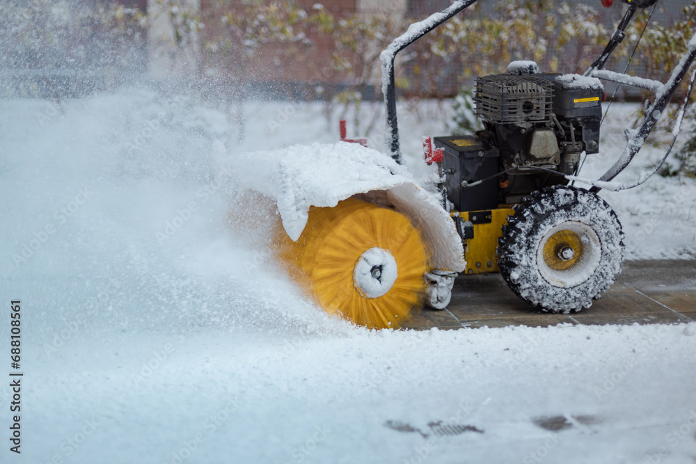 snow plow tractor at winter removing white snow out of road, side view ...