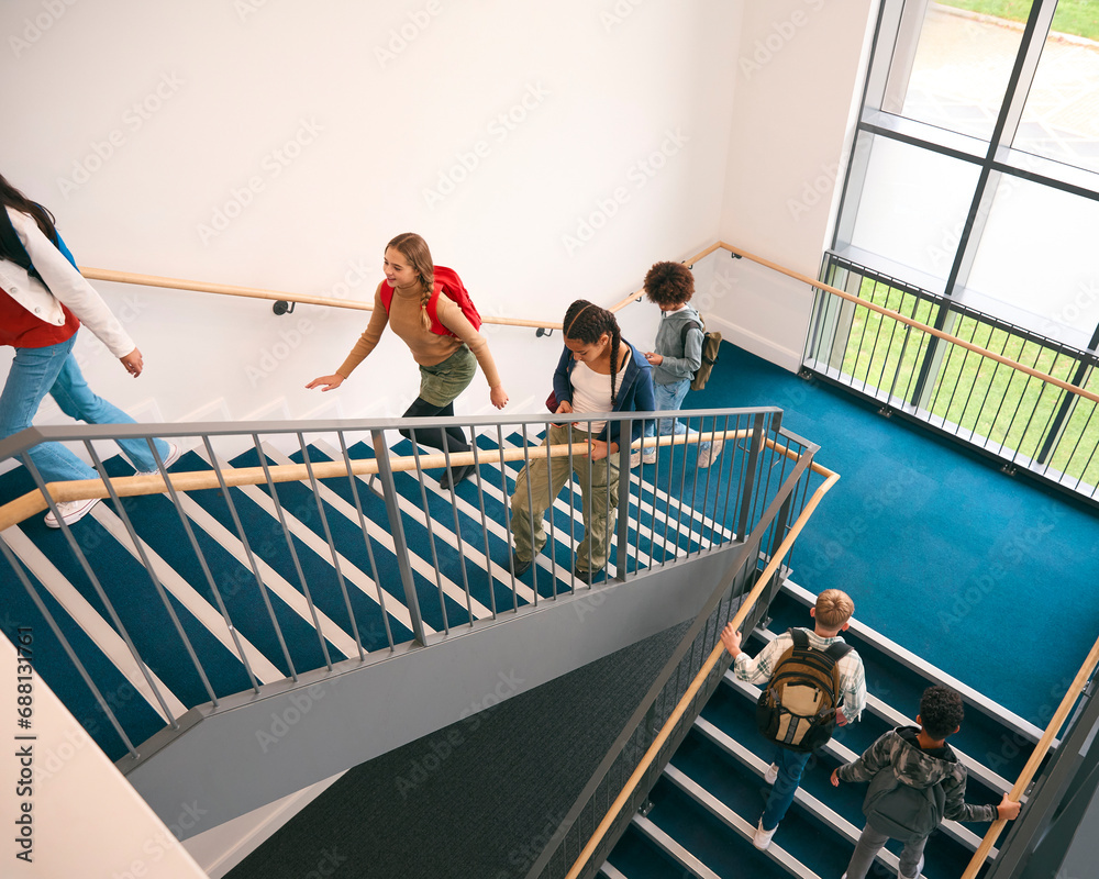 Group Of Secondary Or High School Pupils Inside School Building On ...
