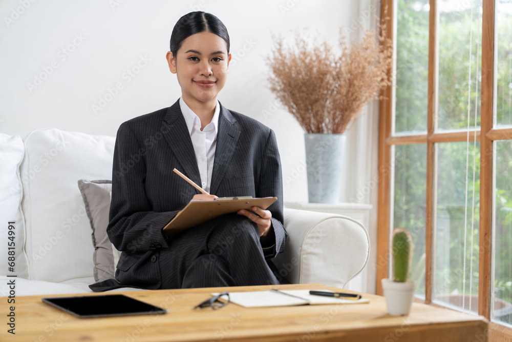 Psychologist woman in clinic office professional portrait with friendly ...