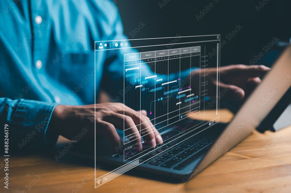 Analyst working with computer in Business Analytics and Data Management ...