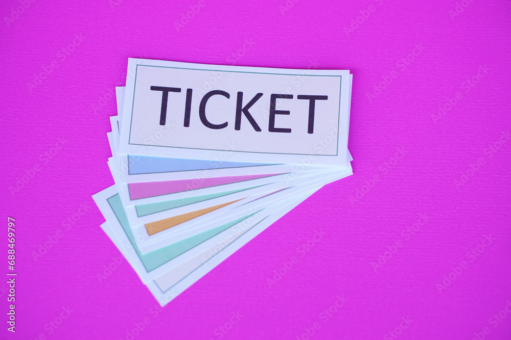 Pile of overlapped ticket paper cards on pink background. Concept ...