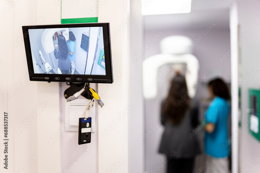 Photo of the screen of a camera inside an X-ray room to perform paramic ...