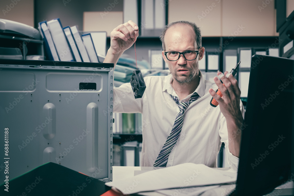 Confused sad office manager doesn't know what to do with broken ...