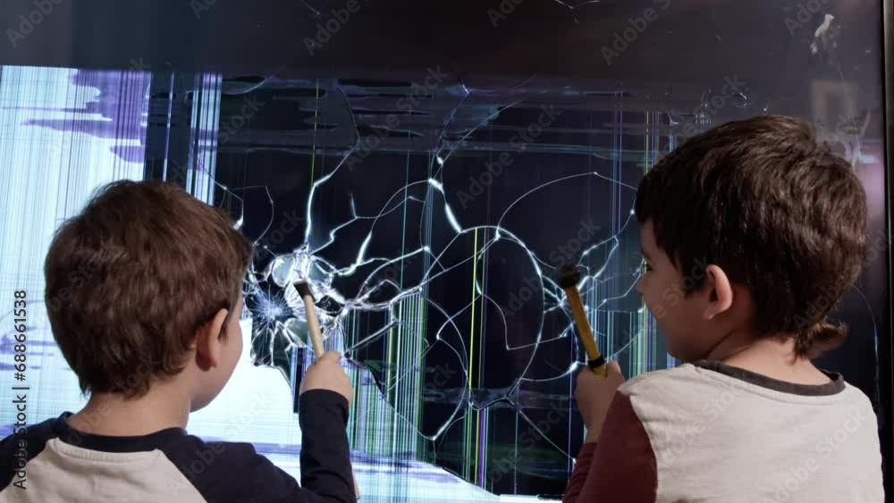 Two young brothers break an expensive LCD TV using their father's ...