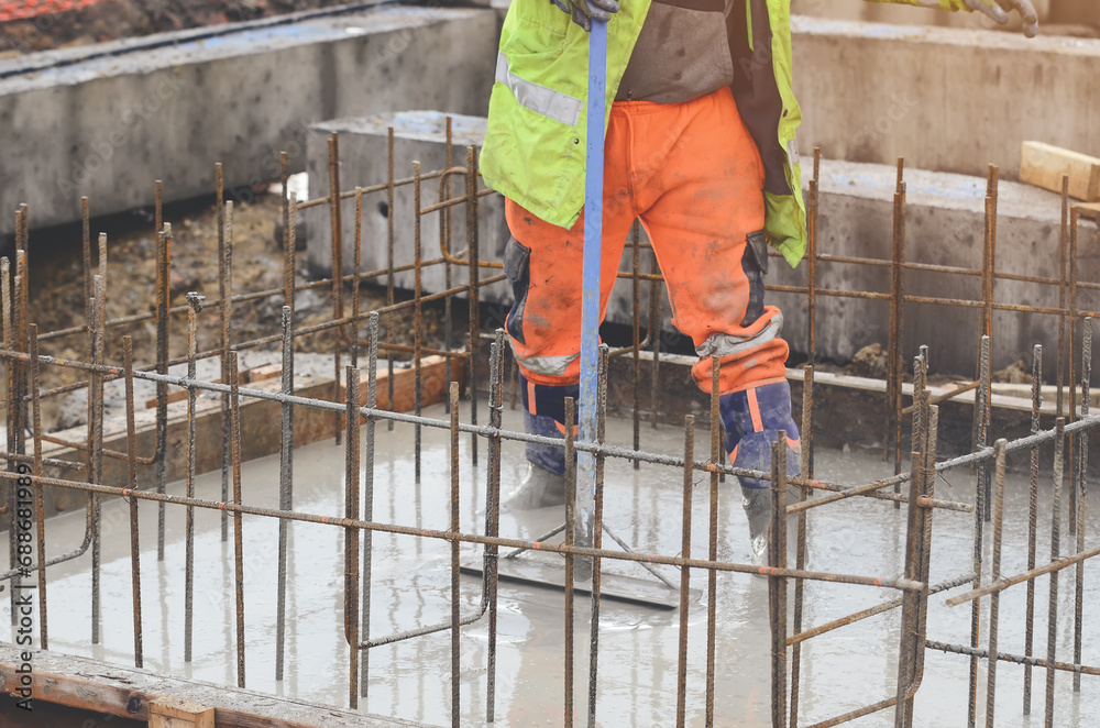 Concrete cast-in-place work. Builder level wet concrete. Concrete works ...