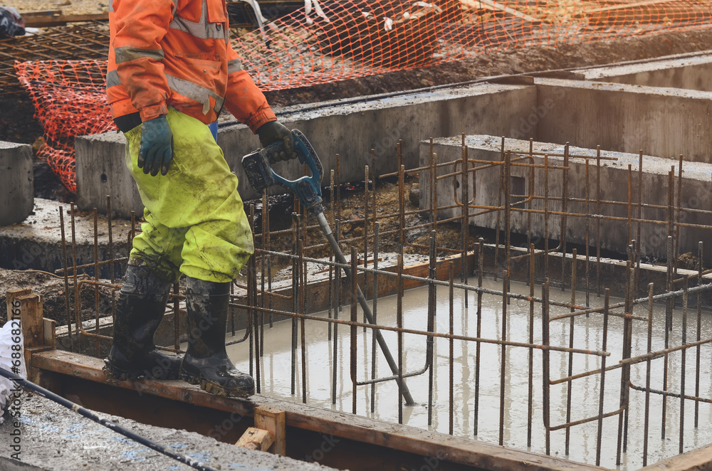Concrete cast-in-place work. Builder level wet concrete. Concrete works ...