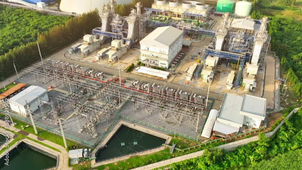 The drone captures the heart of the power plant, where turbines spin ...
