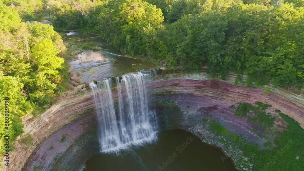 Vidéo Stock Aerial footage of flowing Balls Falls waterfall into a deep ...
