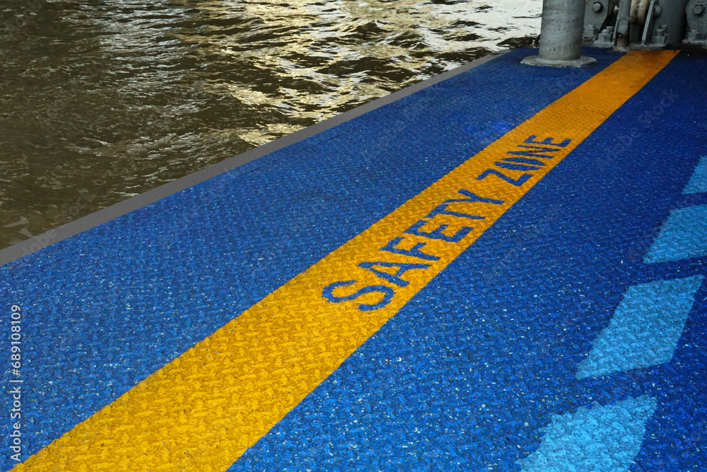 Blue Embossed metal sheet floor pattern surface with text , Safety Zone ...