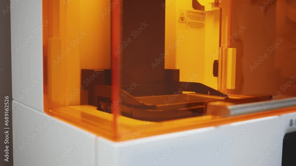 Close-up of contemporary new 3D printing machine producing organic ...