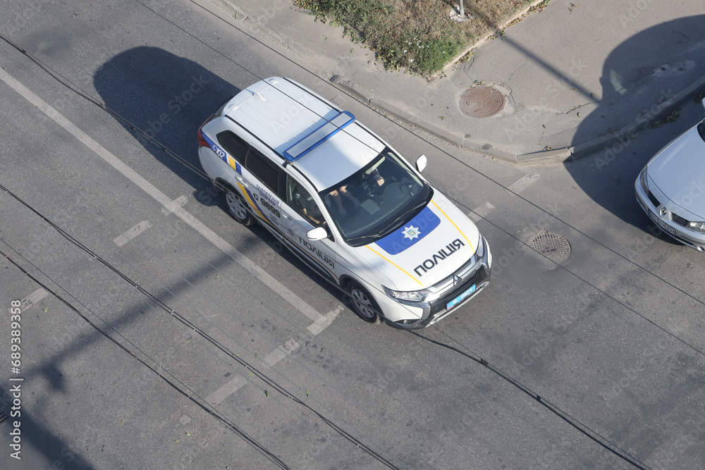 TERNOPIL, UKRAINE - JULY 7, 2023 Ukrainian patrol police white car with ...
